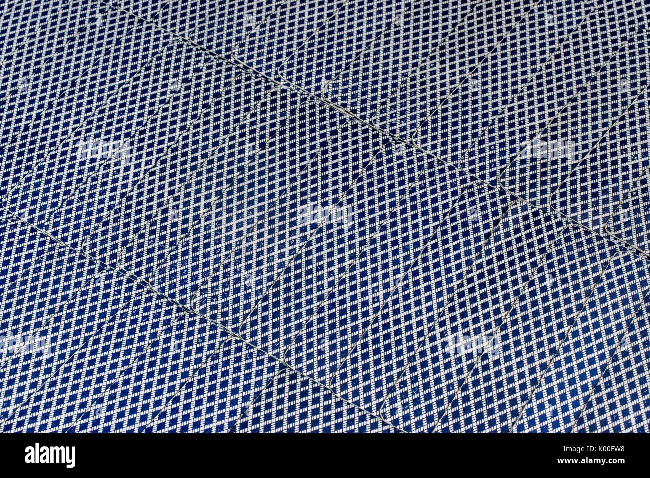 Spread playing cards deck, on a black reflective background, with ...