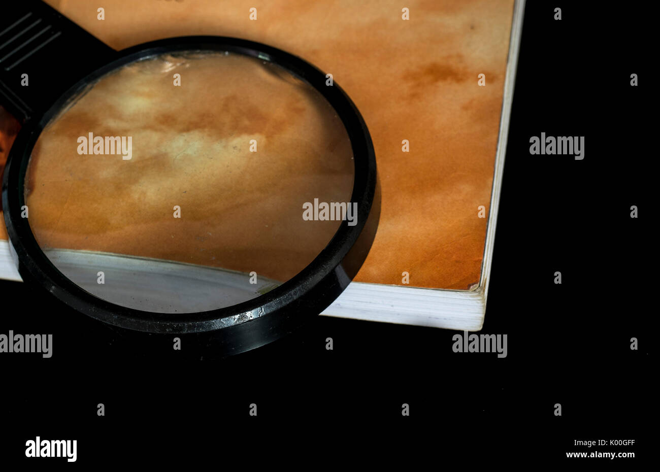 Magnifying glass old document paper hi-res stock photography and images ...