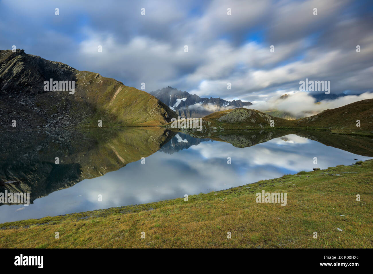 Green pastures and clouds frames The Fenetre Lakes Ferret Valley Saint ...
