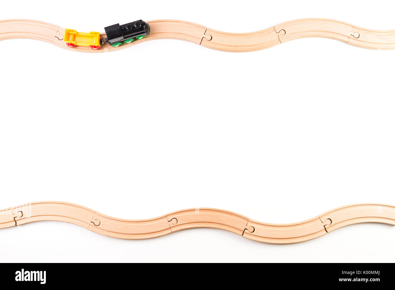 Toys background. Toy train and curve wooden railways on white ...