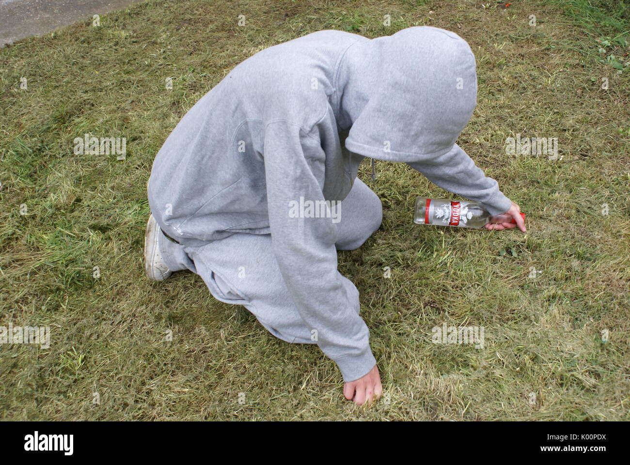 alcoholic, drunk in the street Stock Photo - Alamy