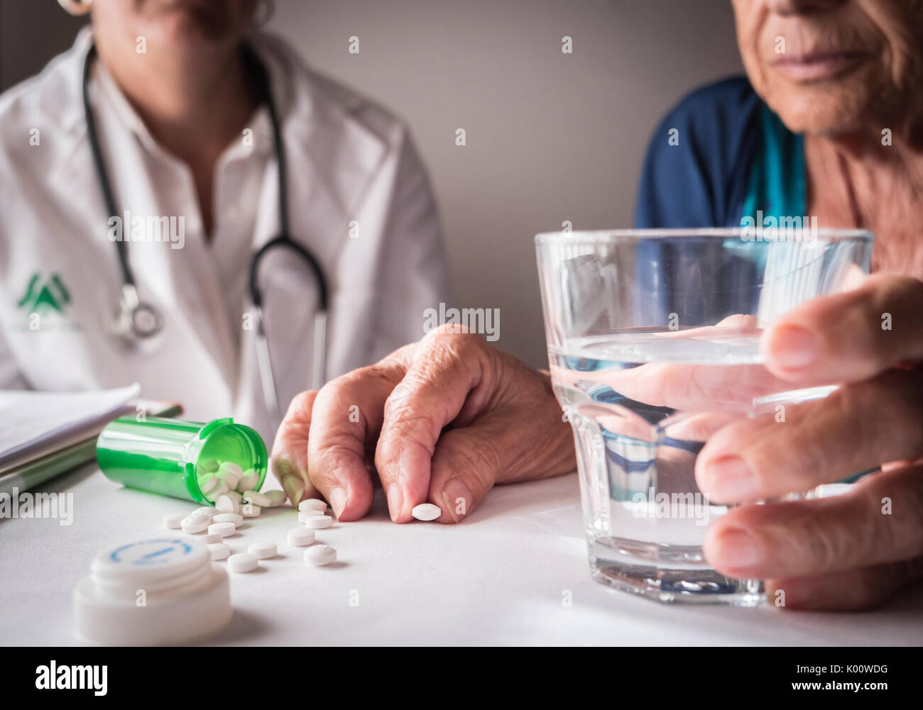 Elderly pills doctor hi-res stock photography and images - Alamy