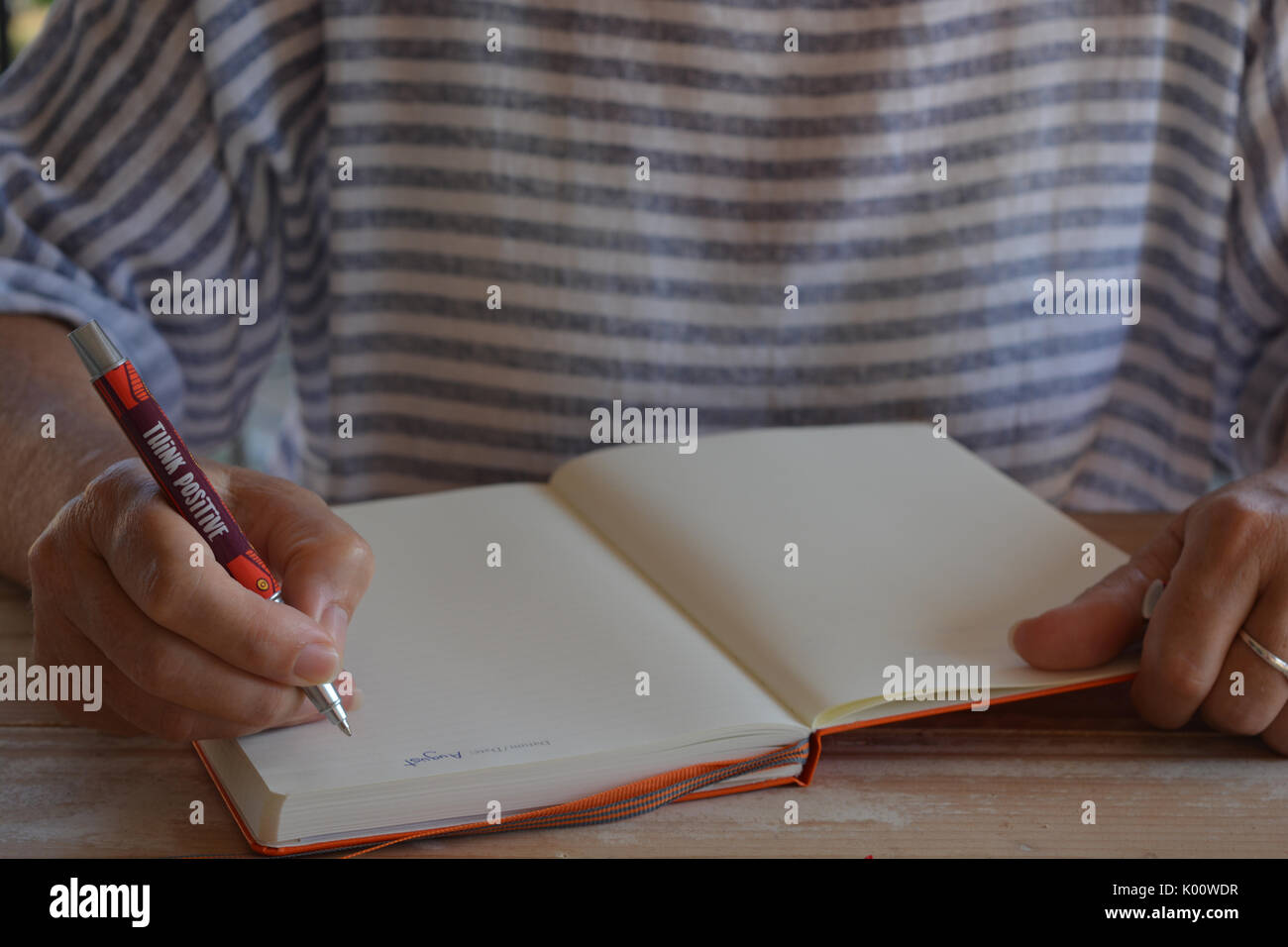 Woman writing in bullet hi-res stock photography and images - Alamy