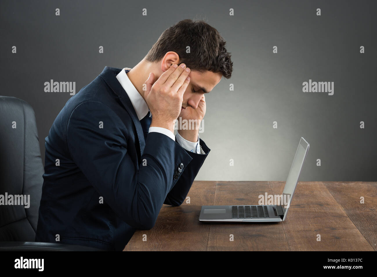 Working at desk office lazy hi-res stock photography and images - Alamy