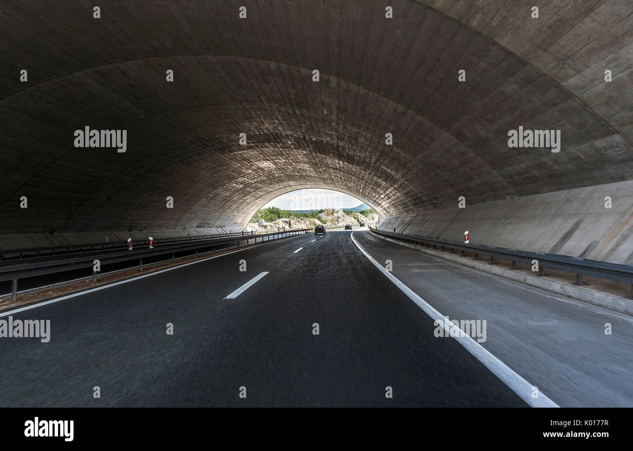 Road in an underground tunnel Stock Photo - Alamy