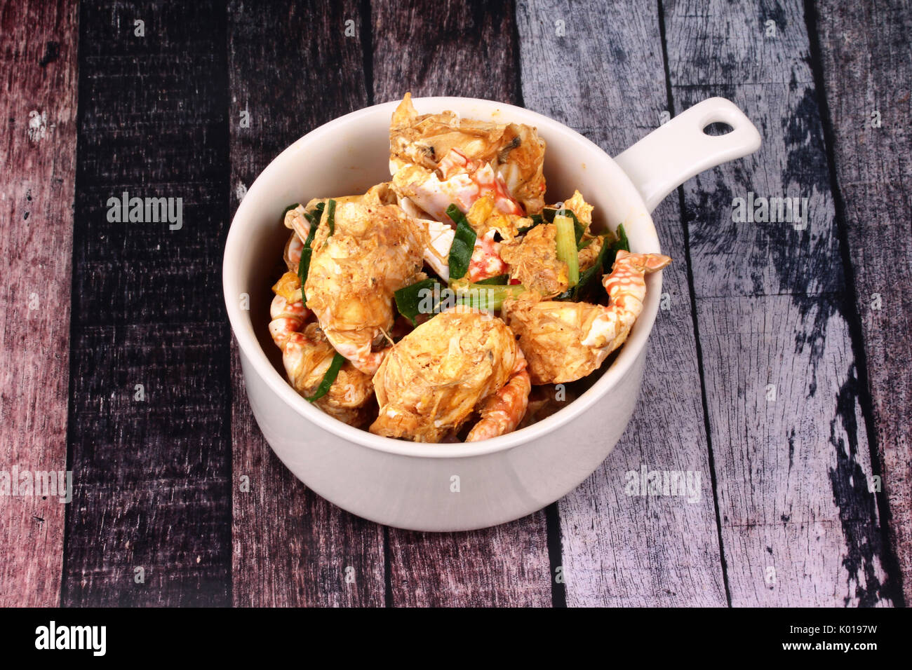 Stir-fried crab in curry powder is top-ten of popular Thai food as seafood to fried with fresh ...