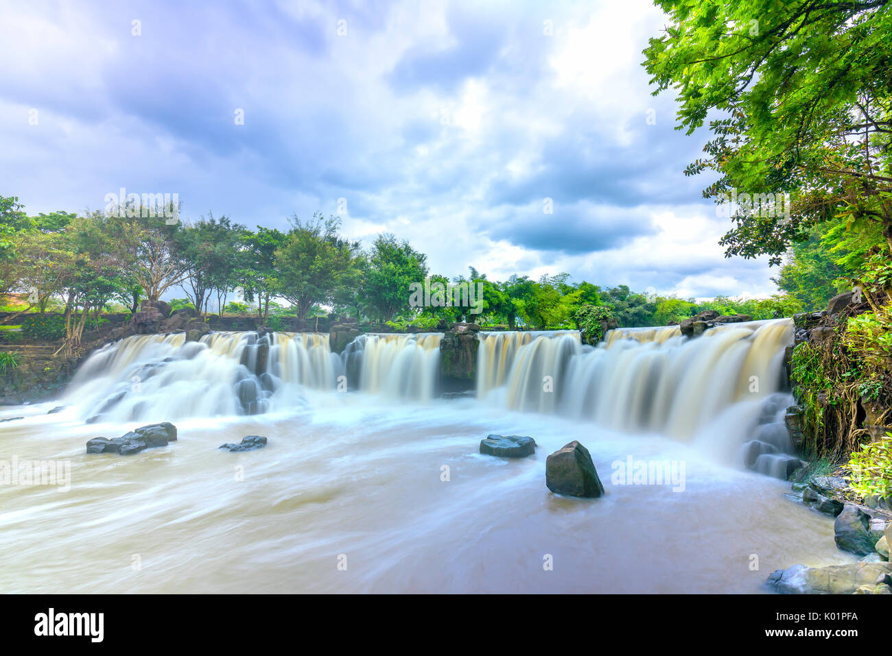 Beautiful waterfalls in Ecotourism with water flowing smooth as silk ...