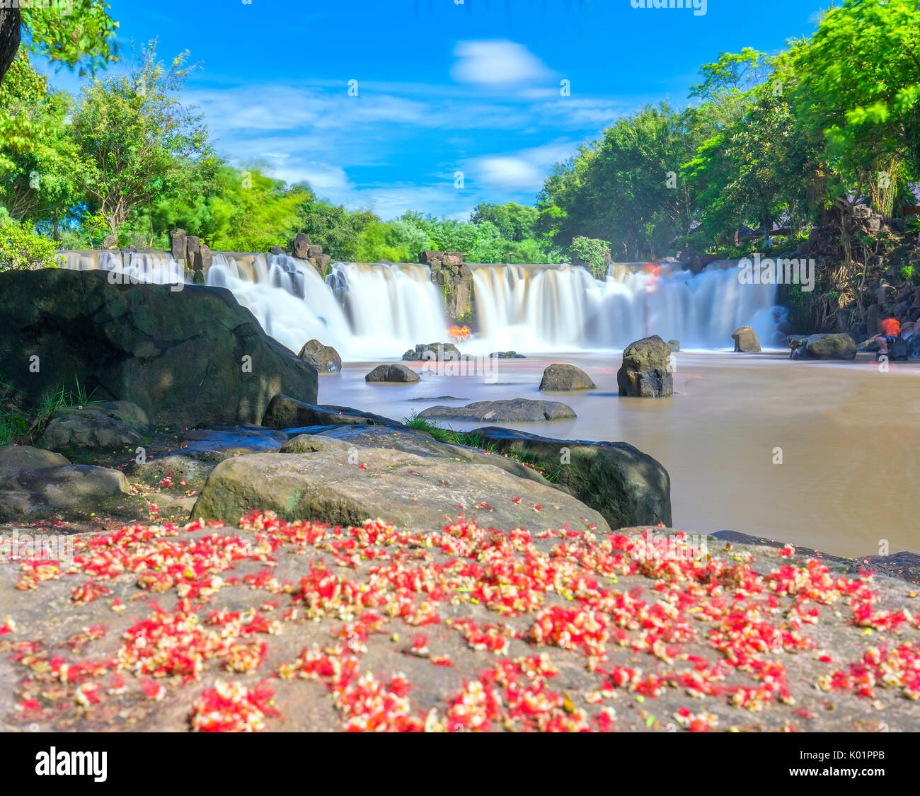 Beautiful waterfalls in Ecotourism with water flowing smooth as silk in ...