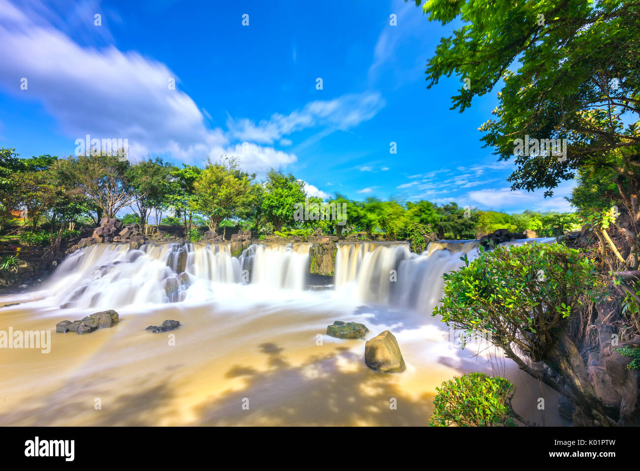 Beautiful waterfalls in Ecotourism with water flowing smooth as silk ...