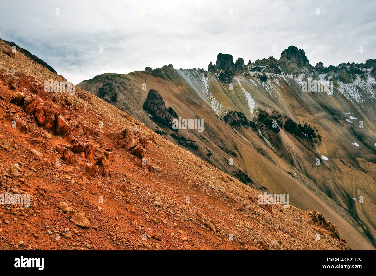 Reaching the last section of the Volcano Tunupa in a scree slope. From ...