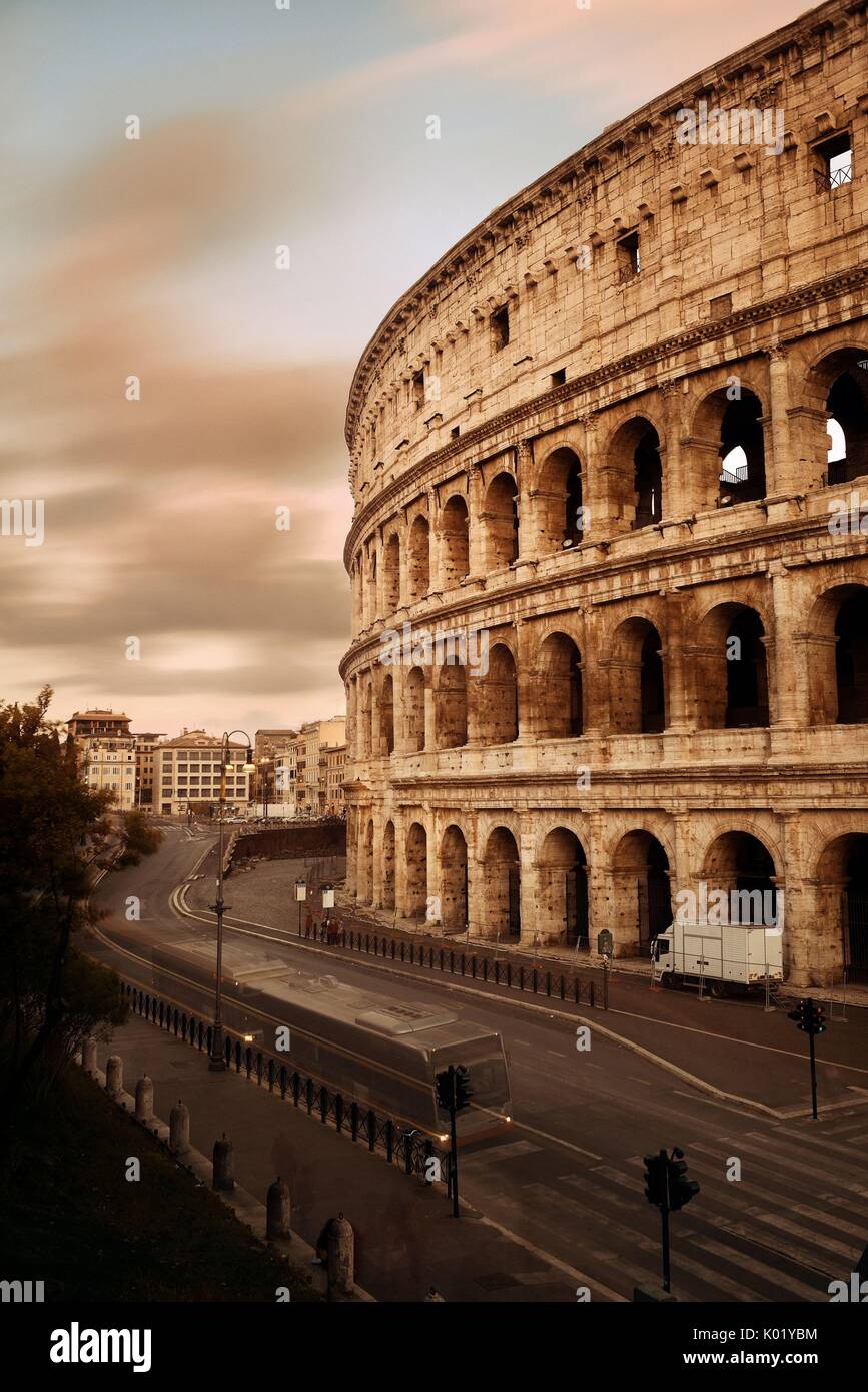 Colosseum with street view at sunset, the world known landmark and the ...