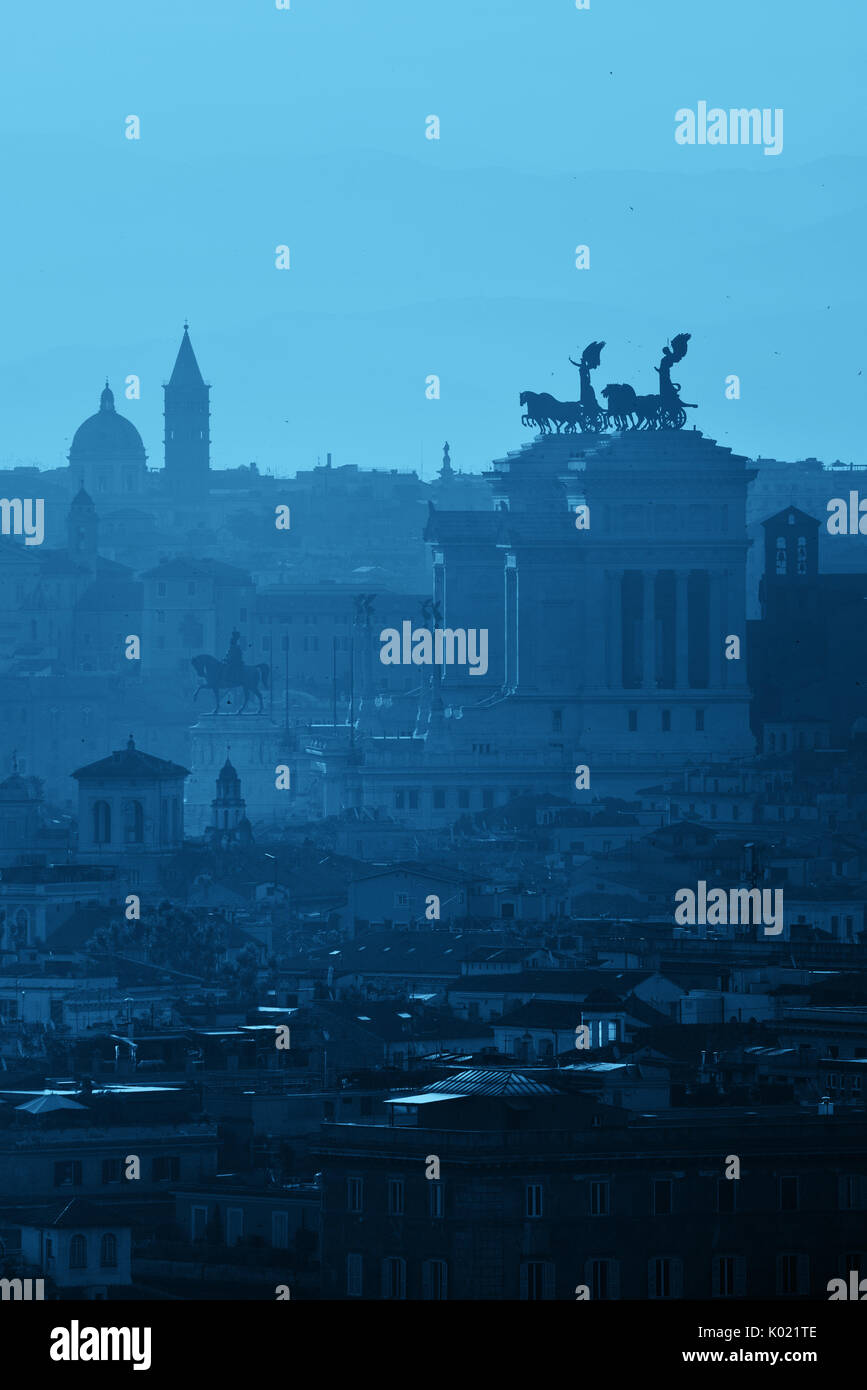 Rome rooftop view at sunset with ancient architecture in Italy in blue ...