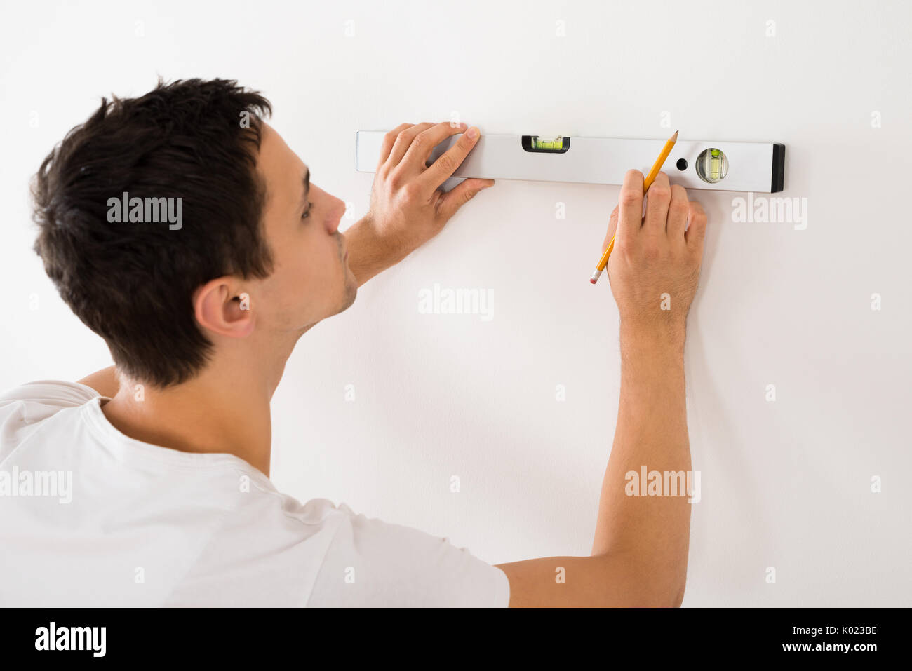 Spirit level man hi-res stock photography and images - Alamy