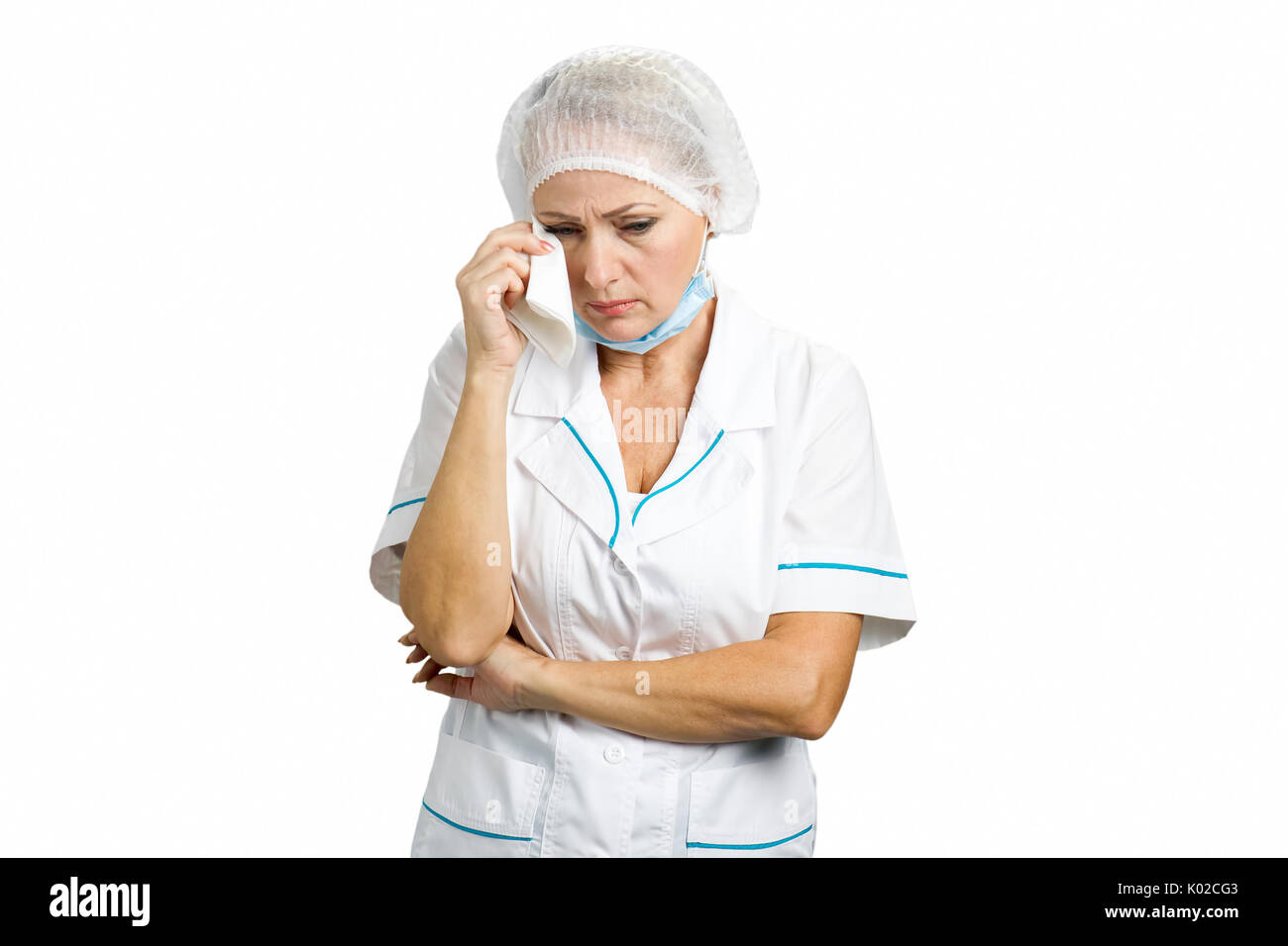 Upset female doctor, white background. Stressed female medicine doctor ...