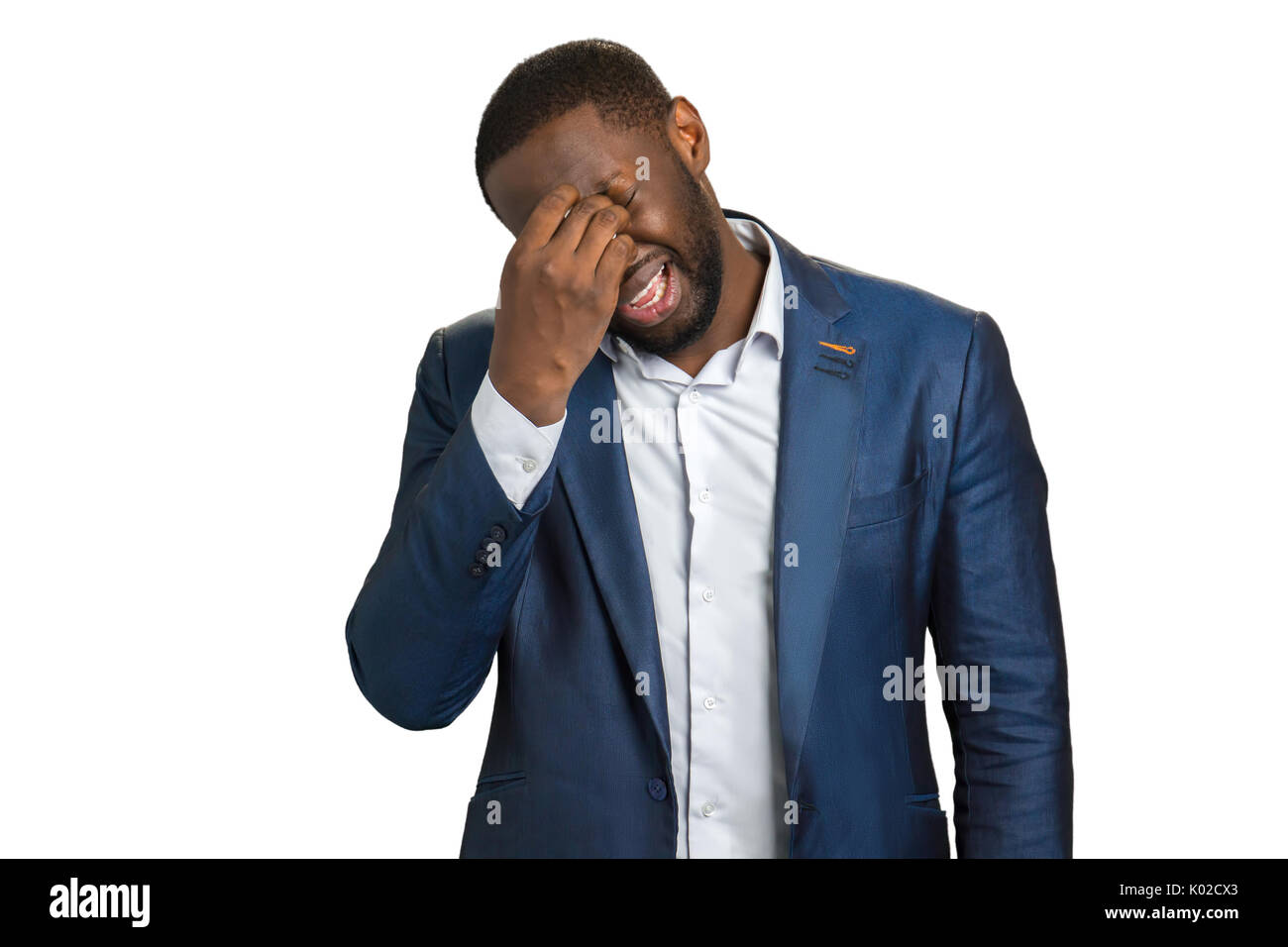 Depressed deeply crying businessman. Desperate young businessman crying ...