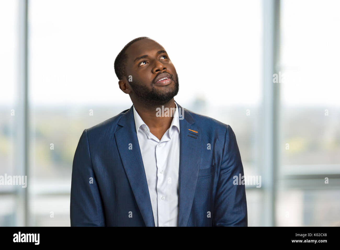 Male eyes looking upwards hi-res stock photography and images - Alamy
