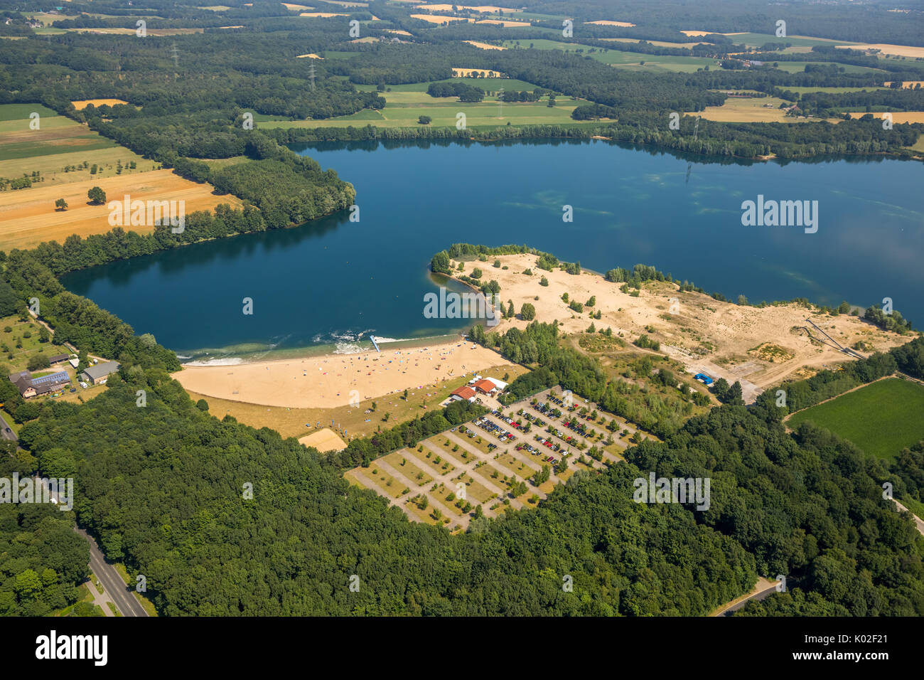 Beach Tenderingssee with the lido and sandbanks in the lake, Voerde ...