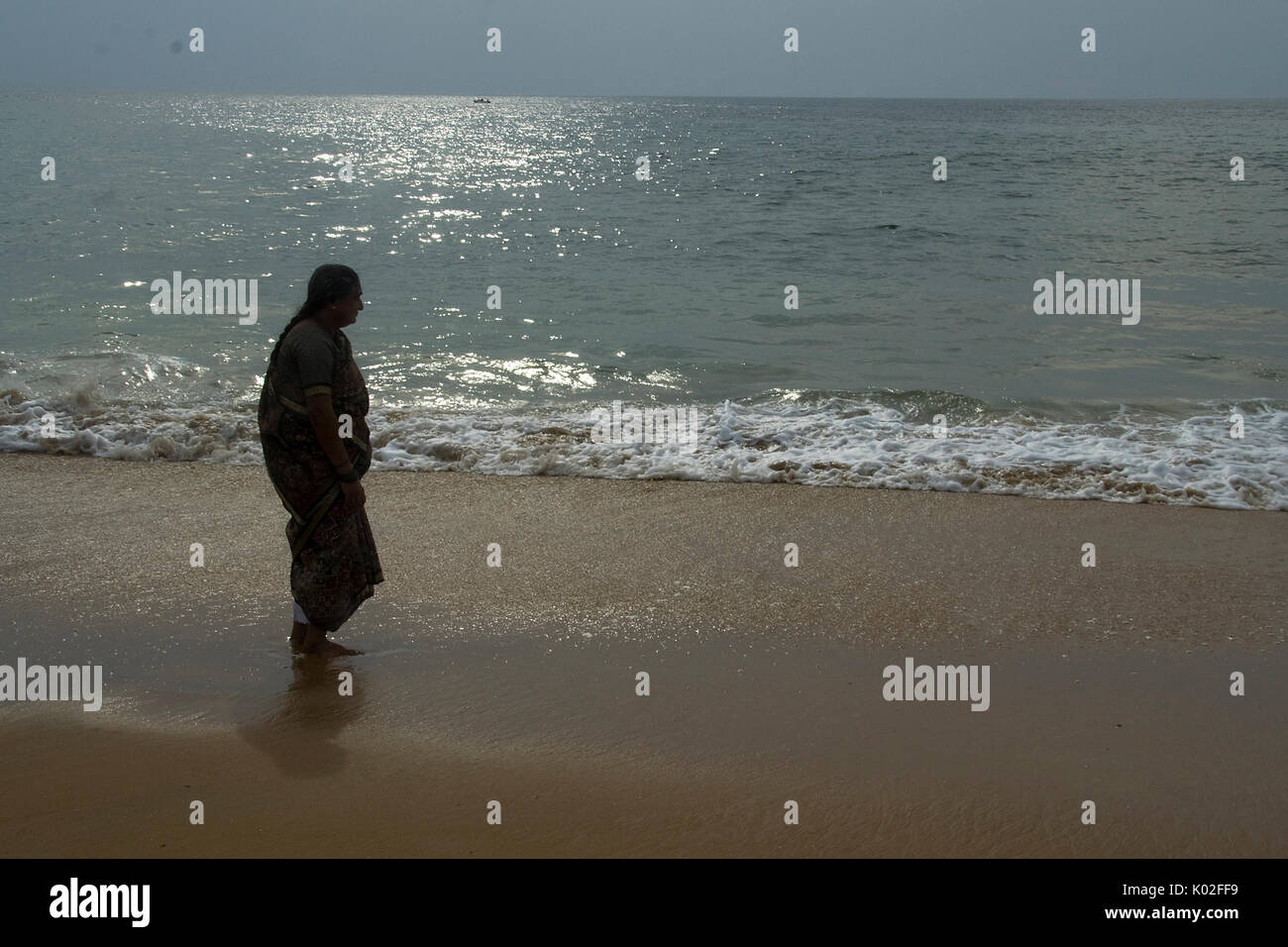 Feeling wet sand and beholding breaking of waves on the beach Uploaded ...