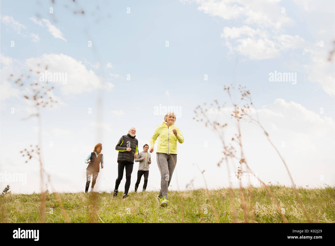 Old friends hugging hi-res stock photography and images - Alamy