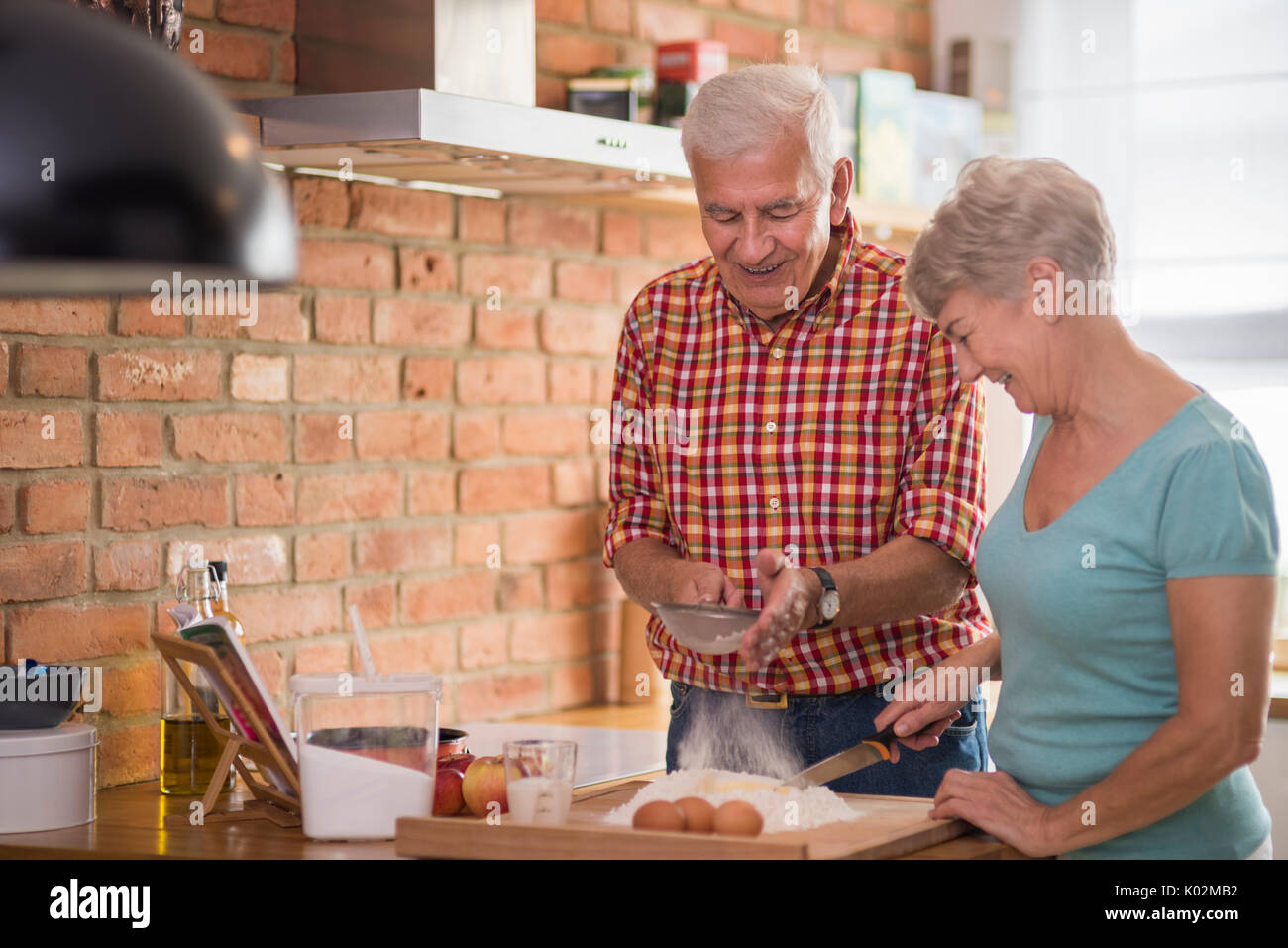 Senior husband is a great helper Stock Photo - Alamy