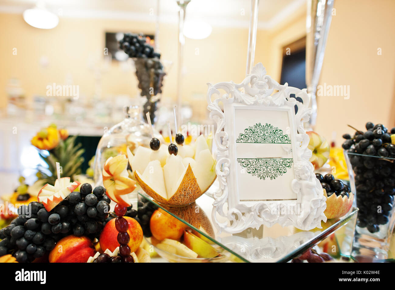 Colorful fruits laying on the beautiful decorated table in the ...
