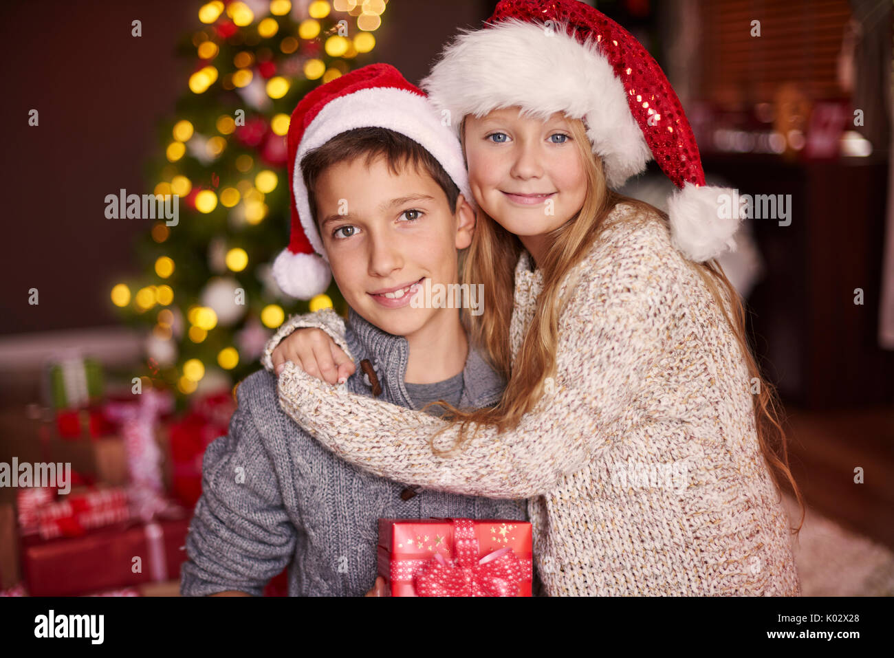 Strong bond between brother and sister Stock Photo - Alamy