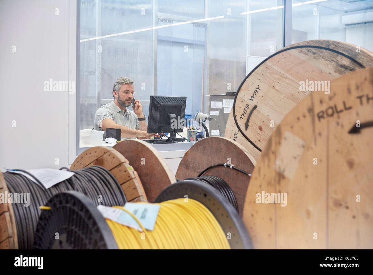 Person working on computer behind hi-res stock photography and images ...
