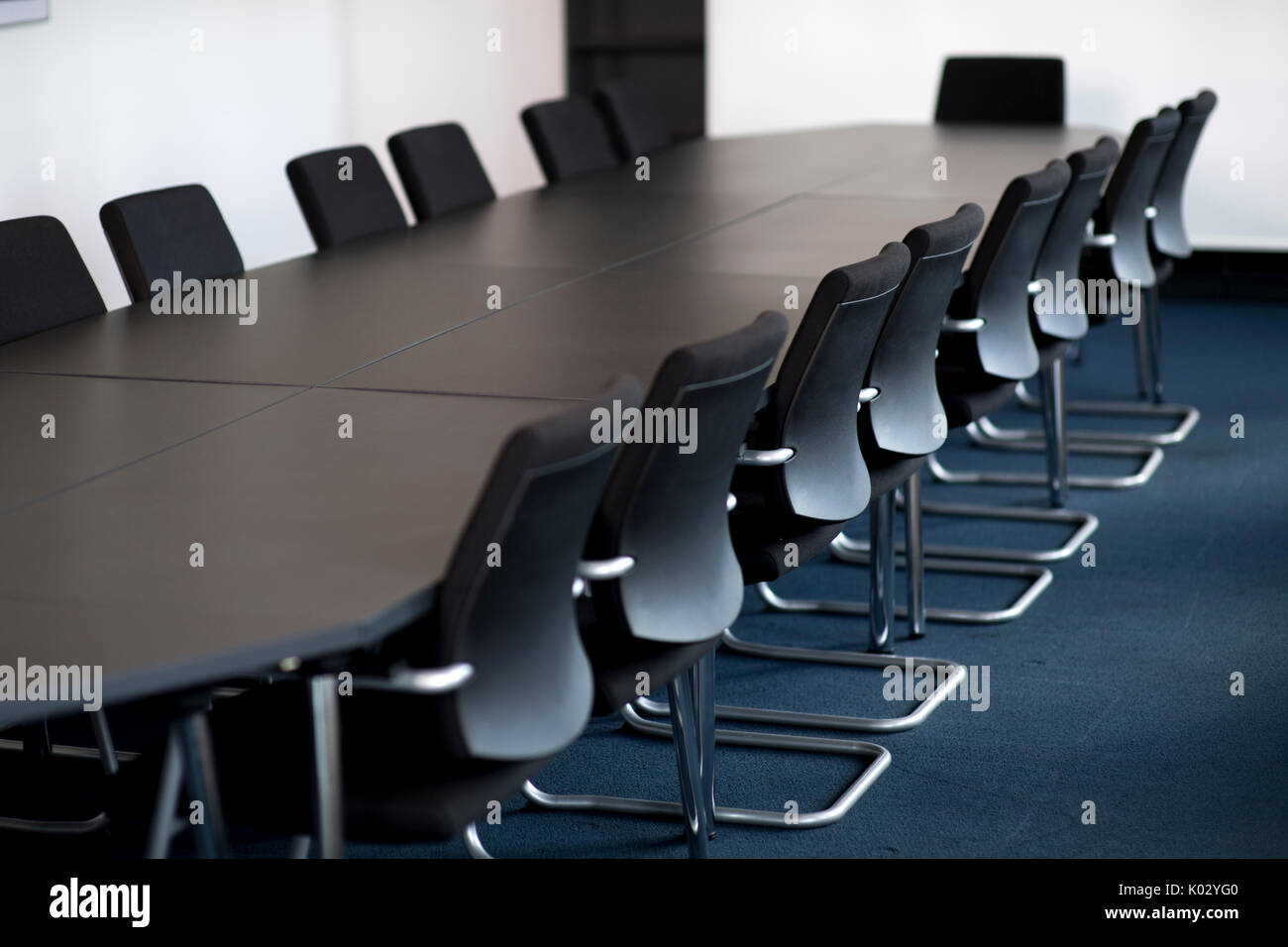 conference table in an empty meeting room Stock Photo - Alamy