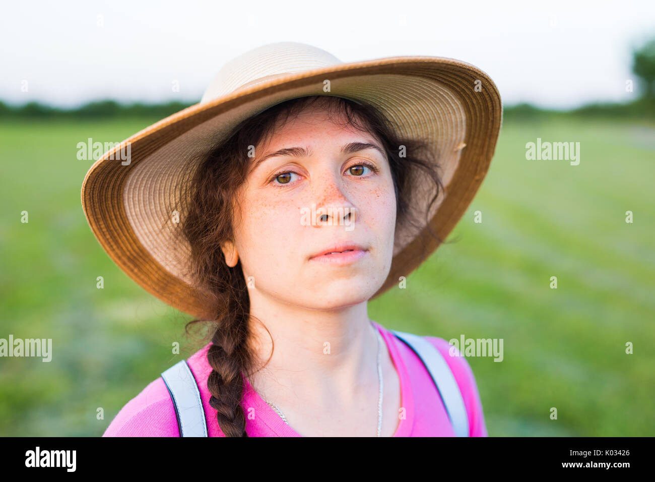 Close up portrait woman with freckles in summer nature Stock Photo - Alamy
