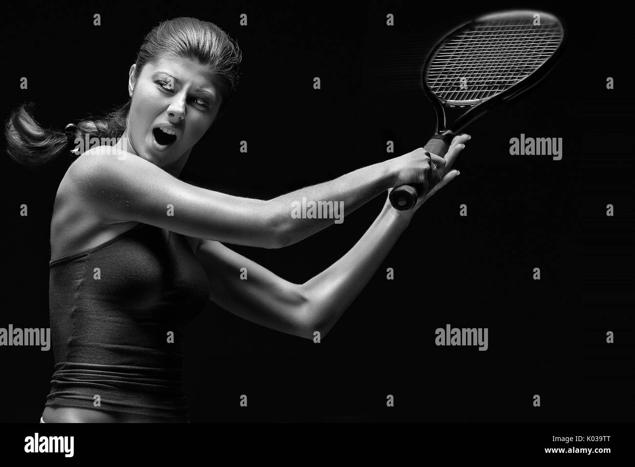 A portrait of a tennis player with a racket Stock Photo - Alamy