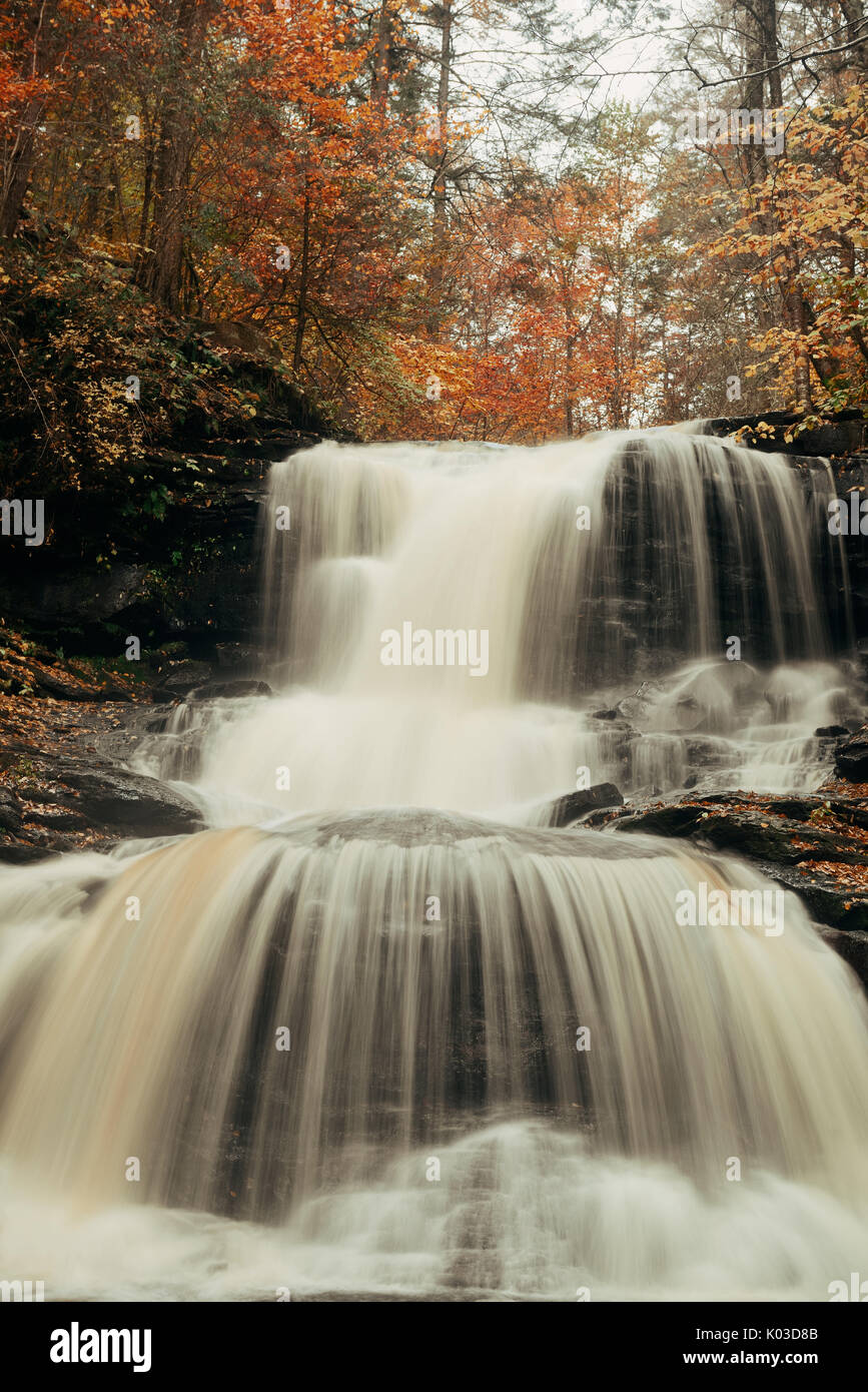 Autumn waterfalls in park with colorful foliage Stock Photo - Alamy