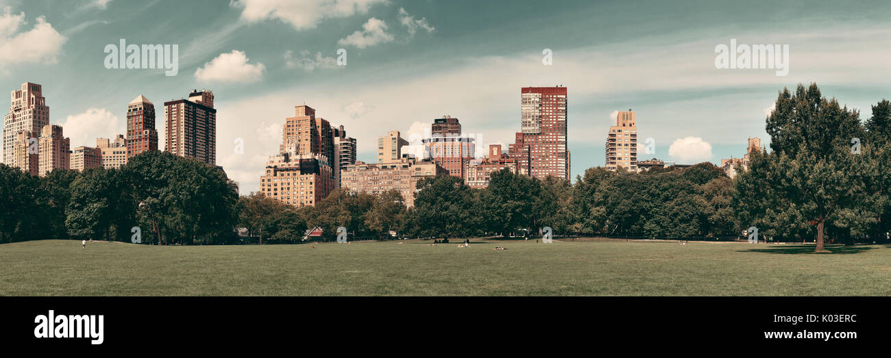 Central Park Spring with skyline in midtown Manhattan New York City ...