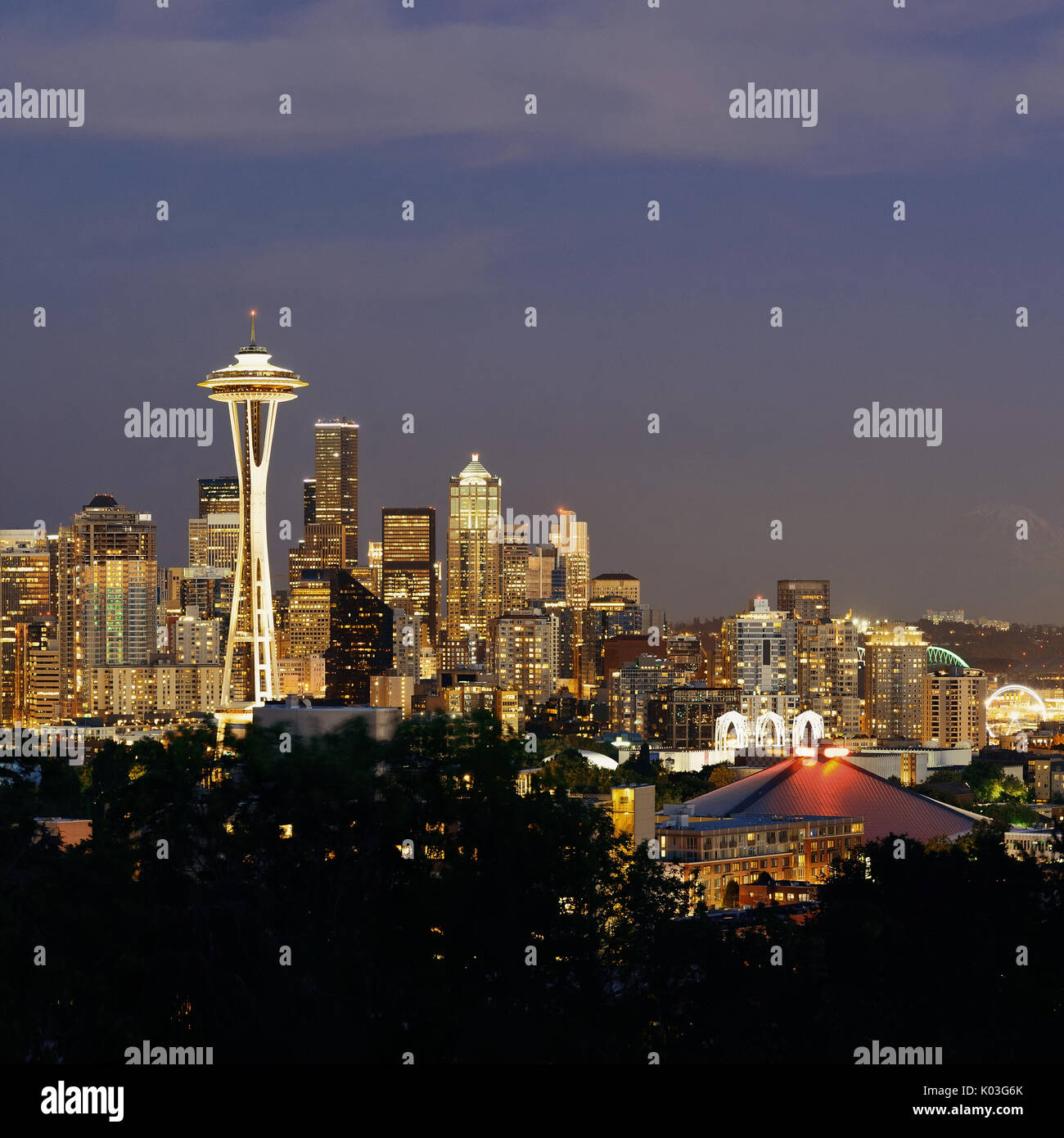 Seattle city skyline at night with urban office buildings viewed from ...