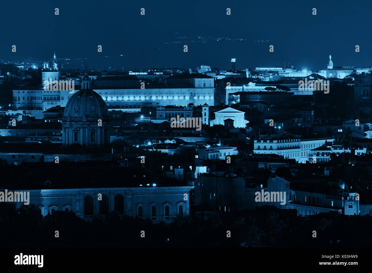 Rome rooftop view with ancient architecture in Italy at night in blue ...