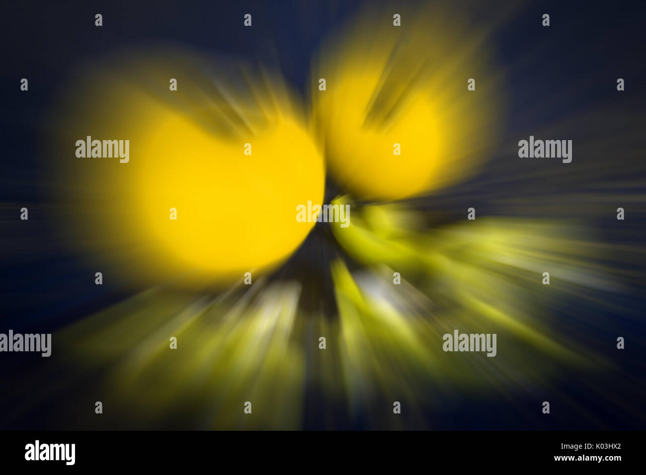 Lemon on blue surface shot with motion blur effect Stock Photo - Alamy