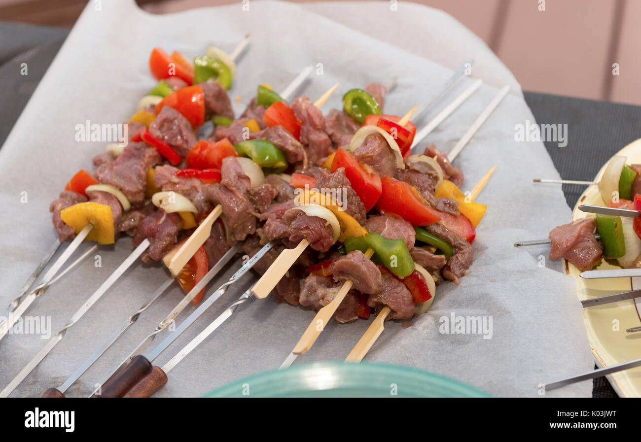 a preparations of meat skewers for barbecue Stock Photo - Alamy
