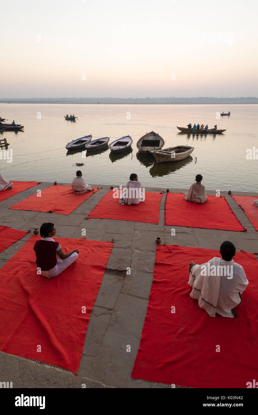 Varanasi, Uttar Pradesh, India, Asia. Morning pray at the Ganges Stock ...