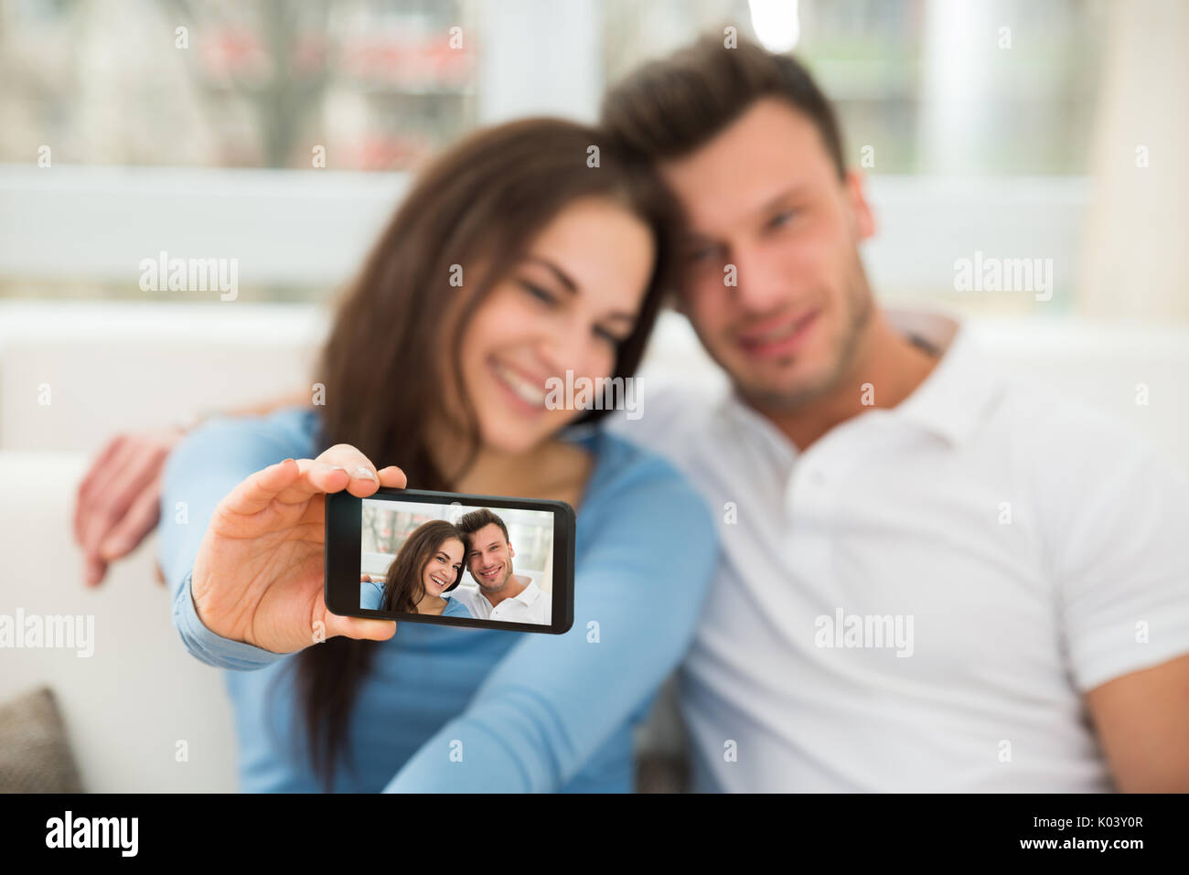 Beautiful caucasian couple taking selfie hi-res stock photography and ...