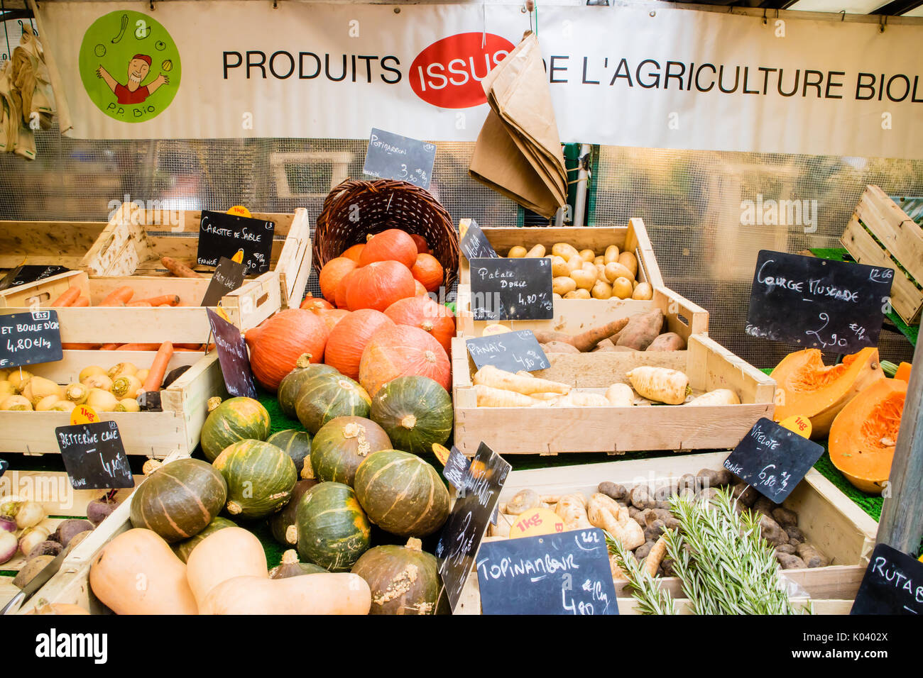 Fruits and vegetables specialities on a stall market in Paris, France ...