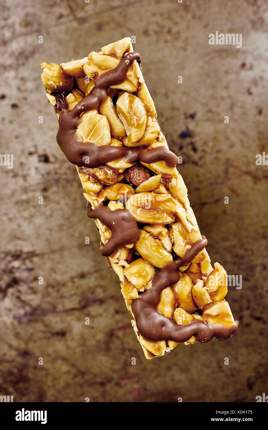 A studio photo of a choc coated nut bar Stock Photo - Alamy