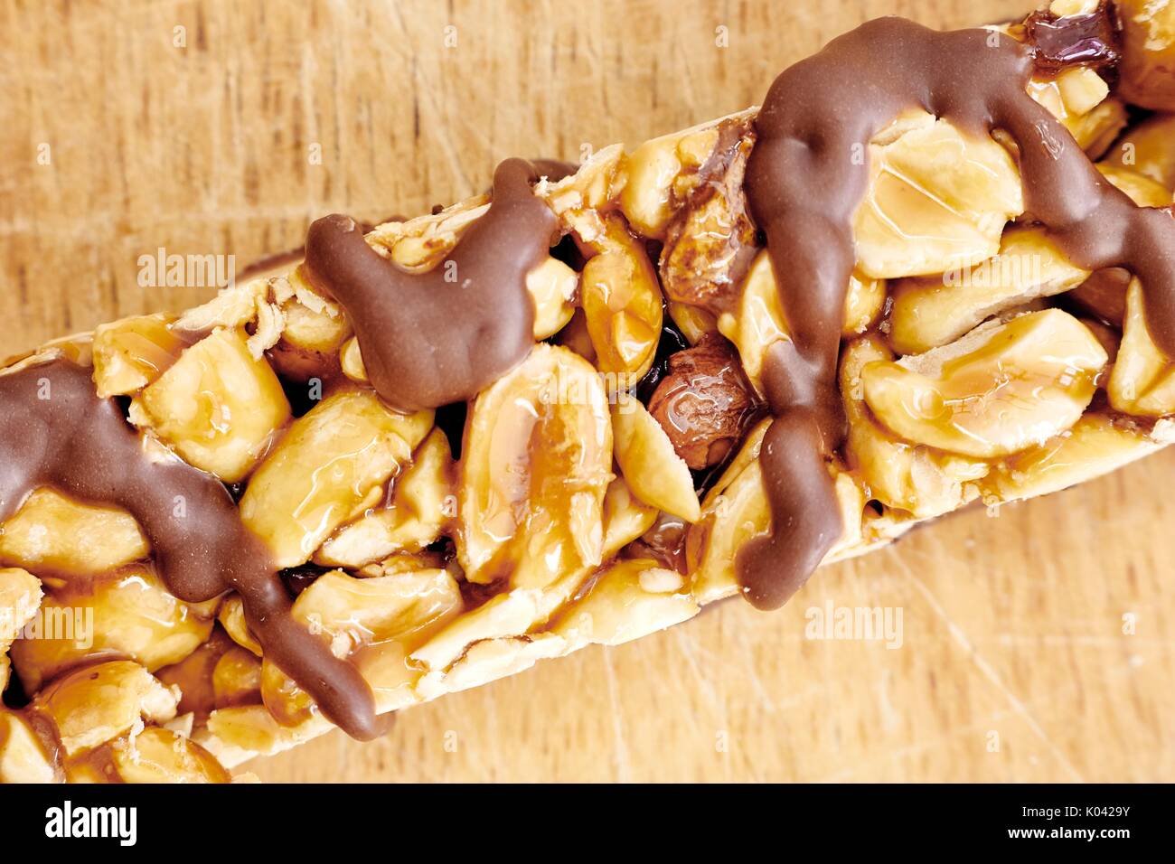 A studio photo of a choc coated nut bar Stock Photo - Alamy