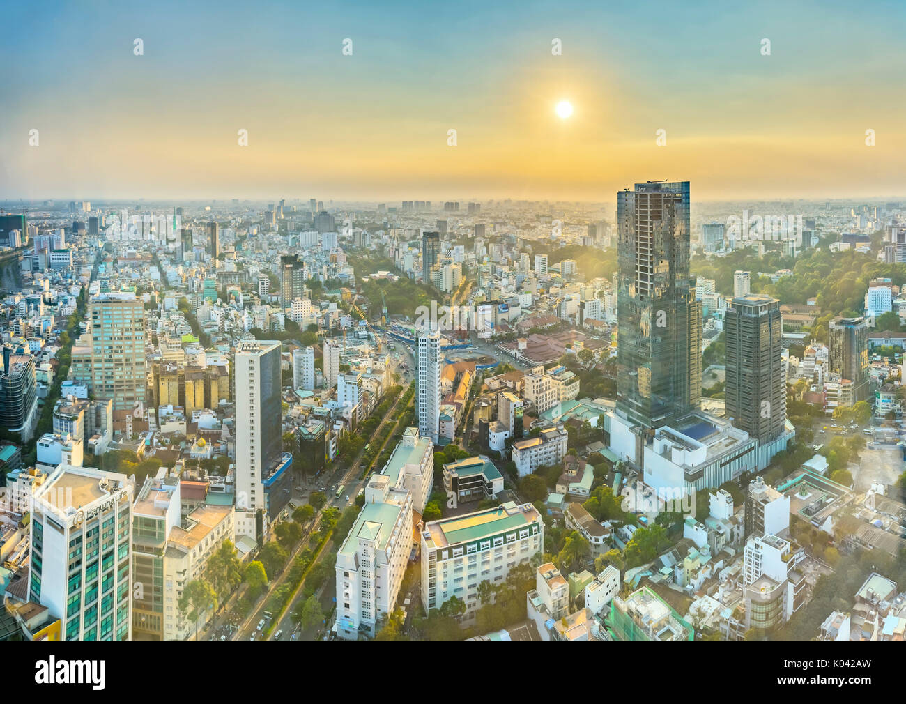 High view Saigon skyline when the sun shines down urban areas with tall ...