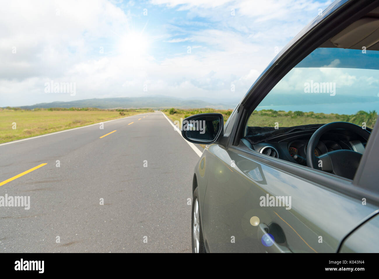 photo of nobody car open window and stop in country roadside with ...
