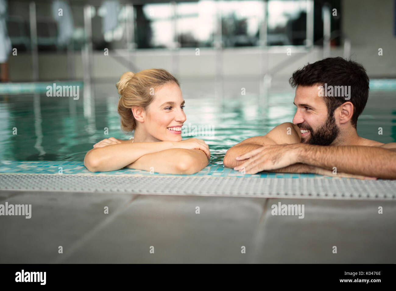 Married couple swimming hi-res stock photography and images - Alamy