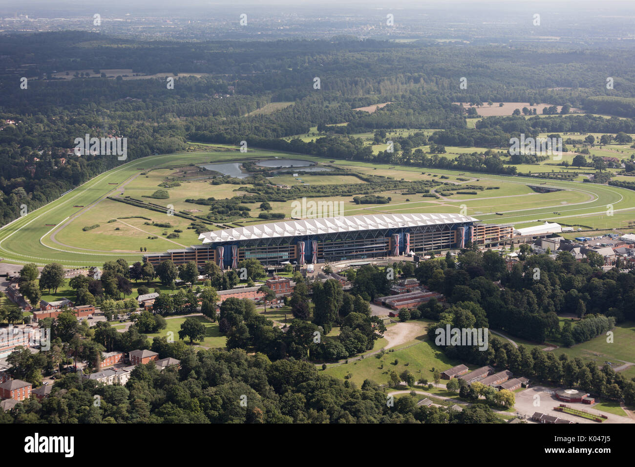 An aerial view of Ascot Racecourse with the main stand prominent Stock ...