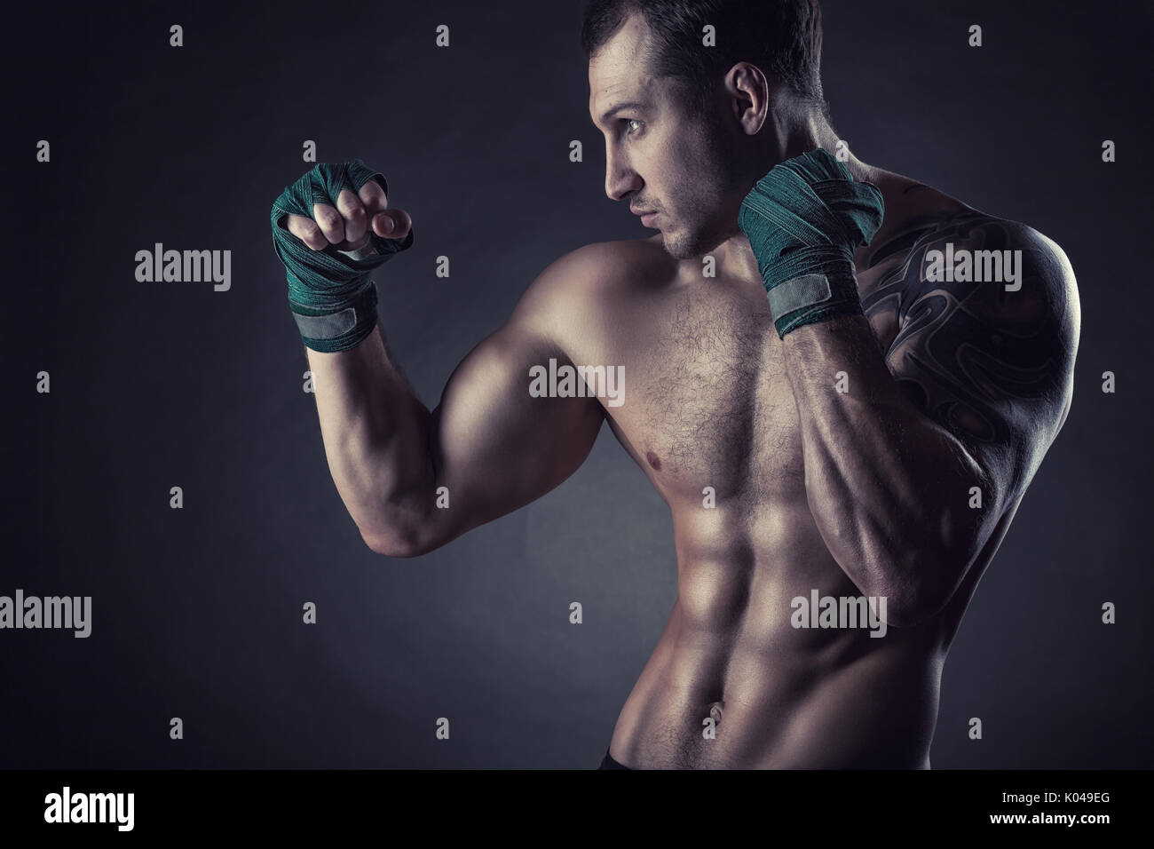 Boxing man ready to fight. Boxer with strong hands and clenched fists ...