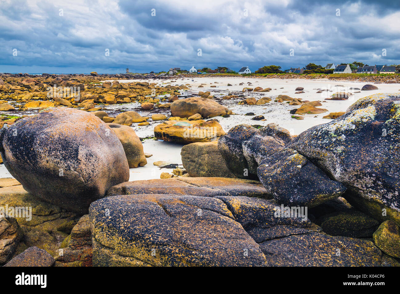 The pink granite rocks with strange shapes, coast in Brittany. The mass ...