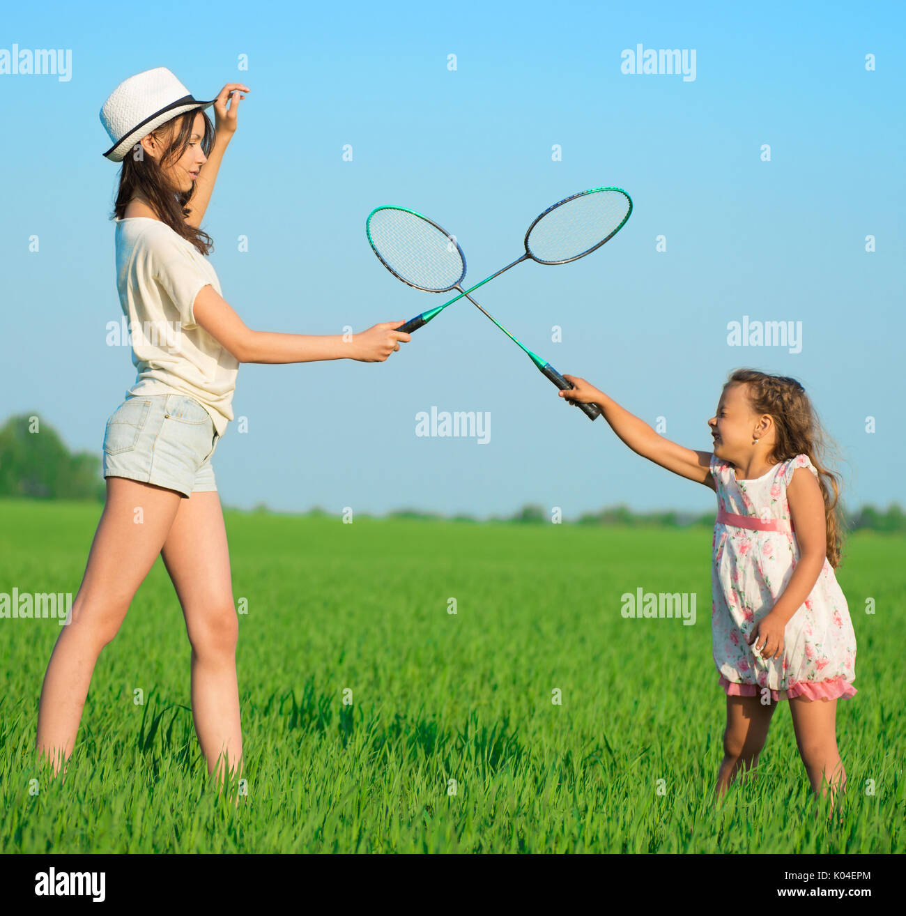 Girls playing badminton park hi-res stock photography and images - Alamy