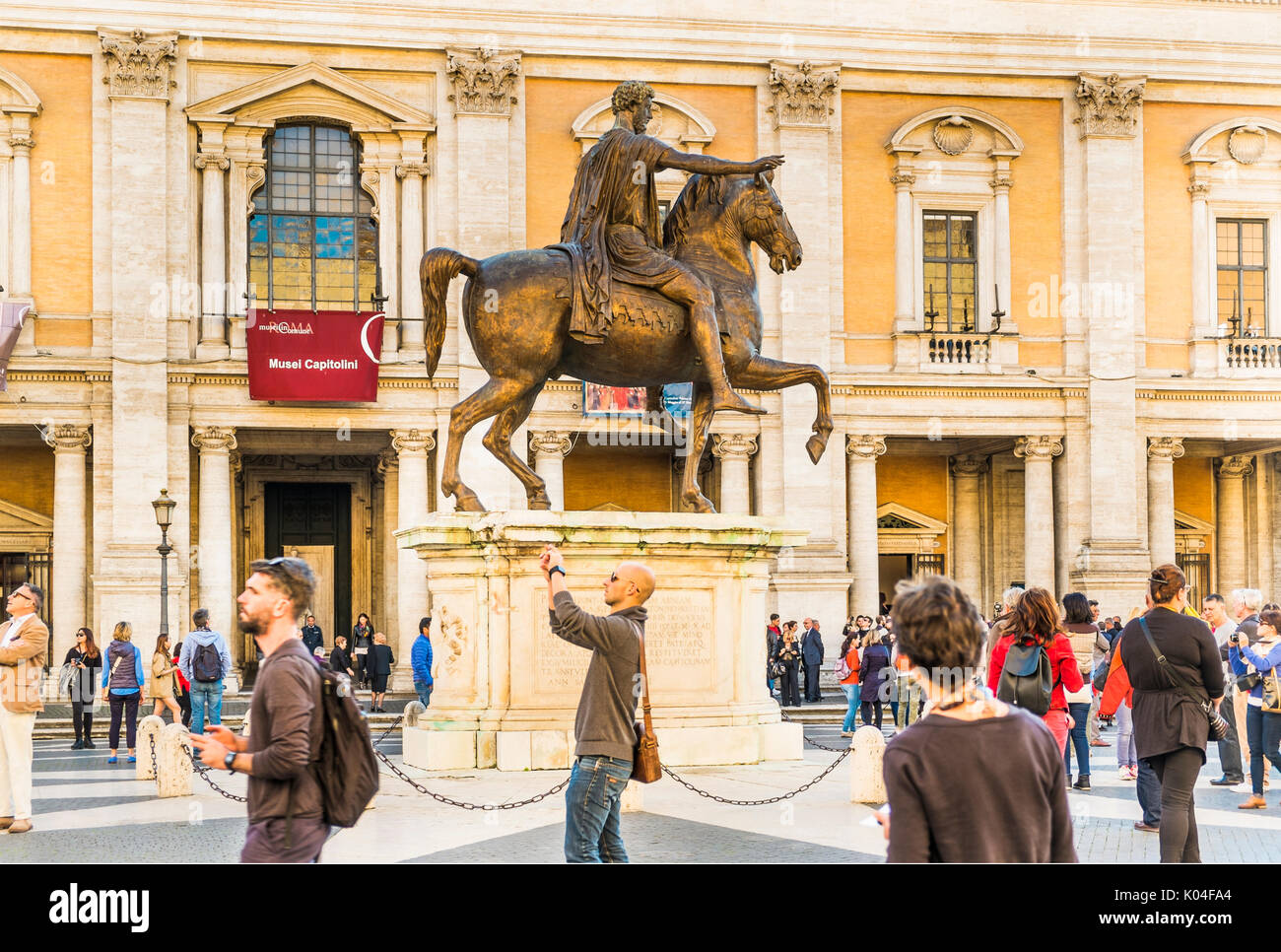 visitors of capitoline museums around equestrian statue of marc aurel ...