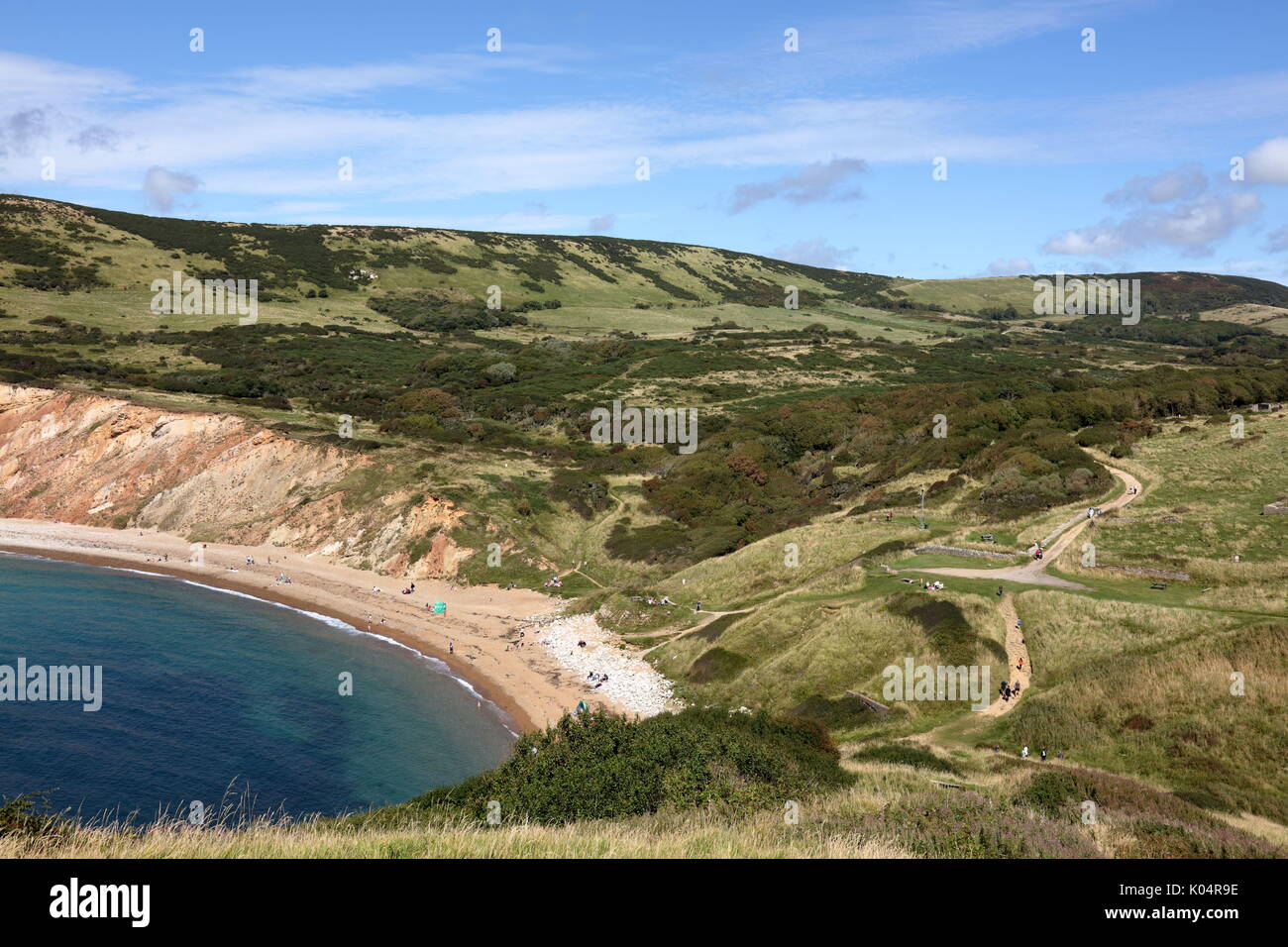 Visitors enjoying warm summer’s day at Worbarrow Bay, near Tyneham ...